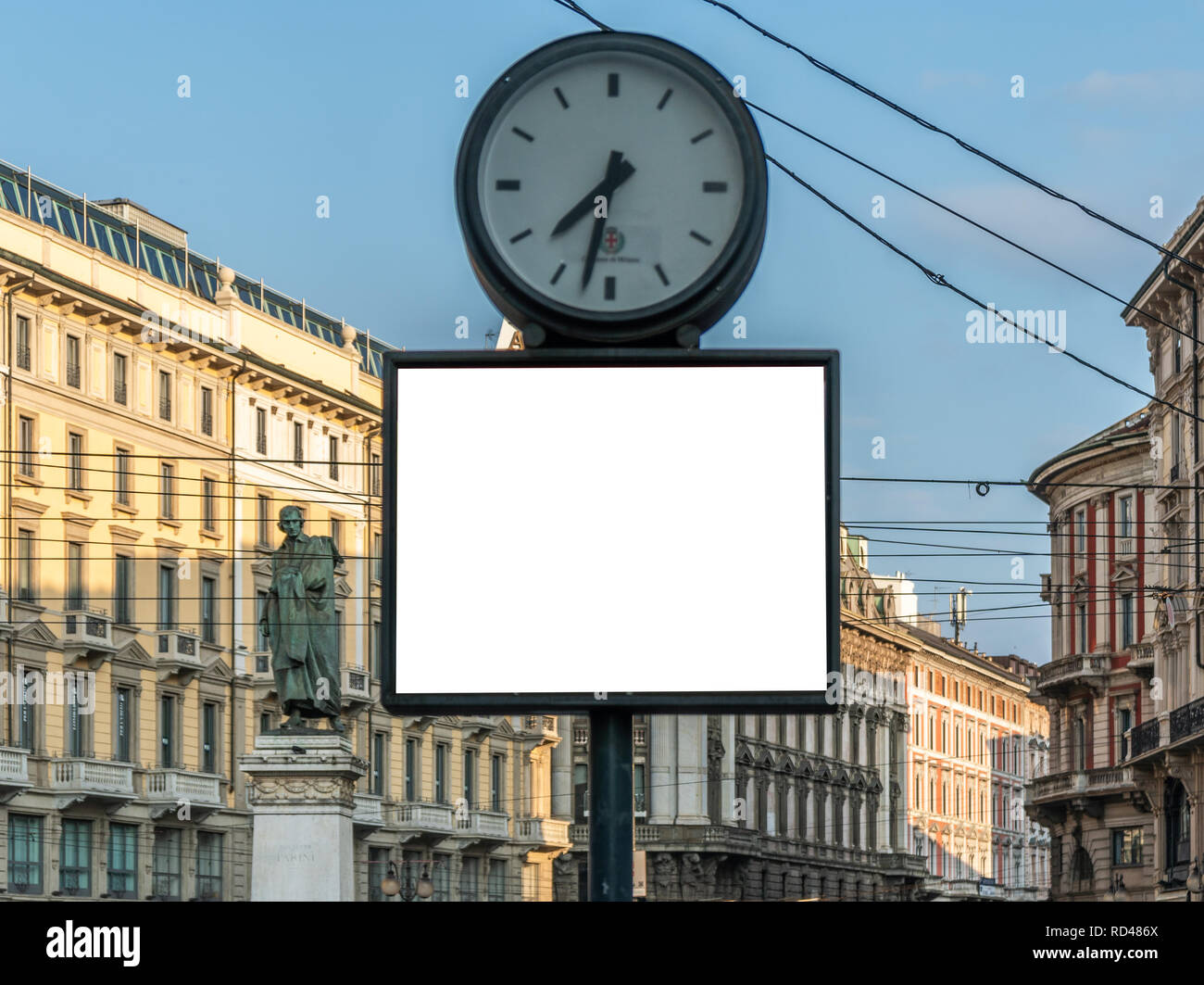 blank billboard mock up in milano city center with background and clock ...