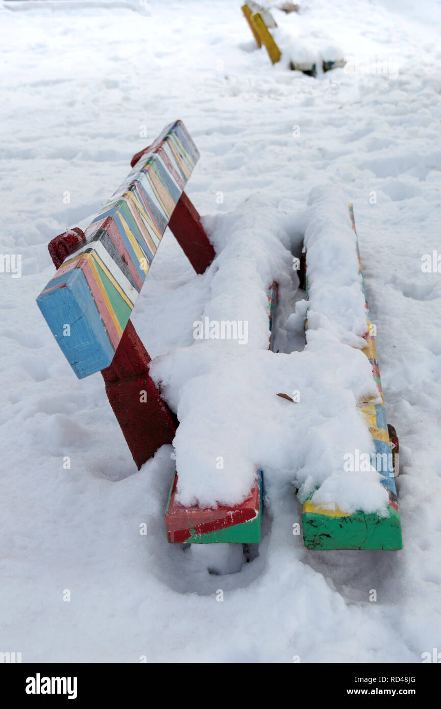 Bench in the snow Stock Photo - Alamy