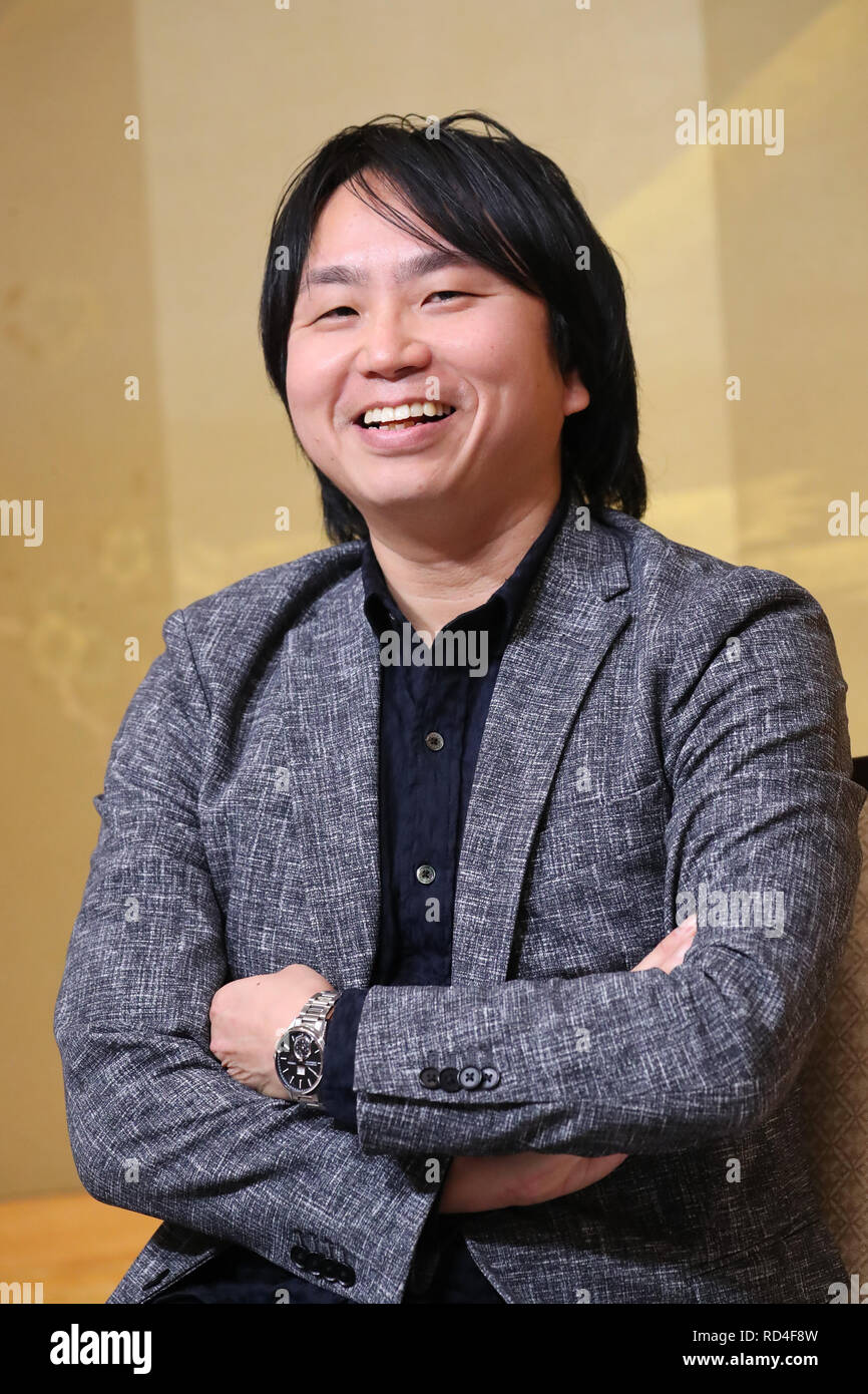 (L-R) One of The 160th Akutagawa Prize winner Takahiro Ueda attends a press conference at the ...