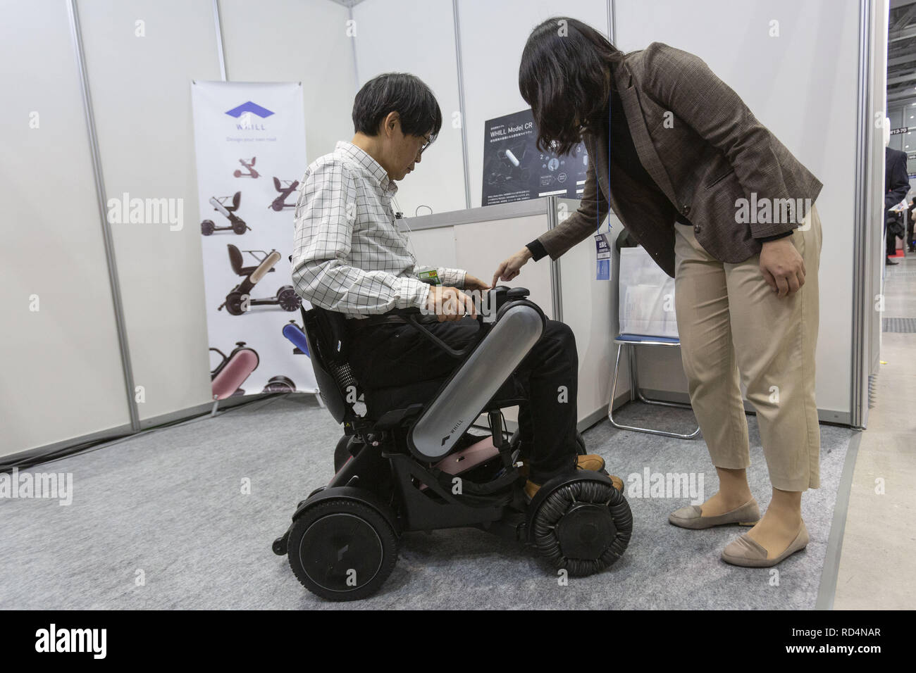 Tokyo, Japan. 17th Jan, 2019. A visitor sits on a smart wheelchair WHILL Model CR during the ...