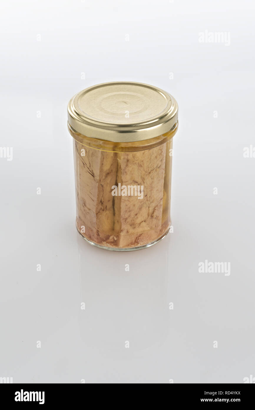 tuna preserved in glass jar in white background oil from above Stock ...