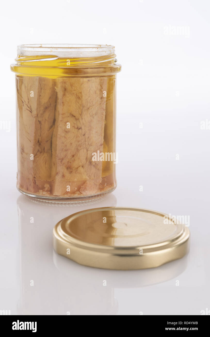 tuna preserved in glass jar in white bottom oil with open cap Stock ...