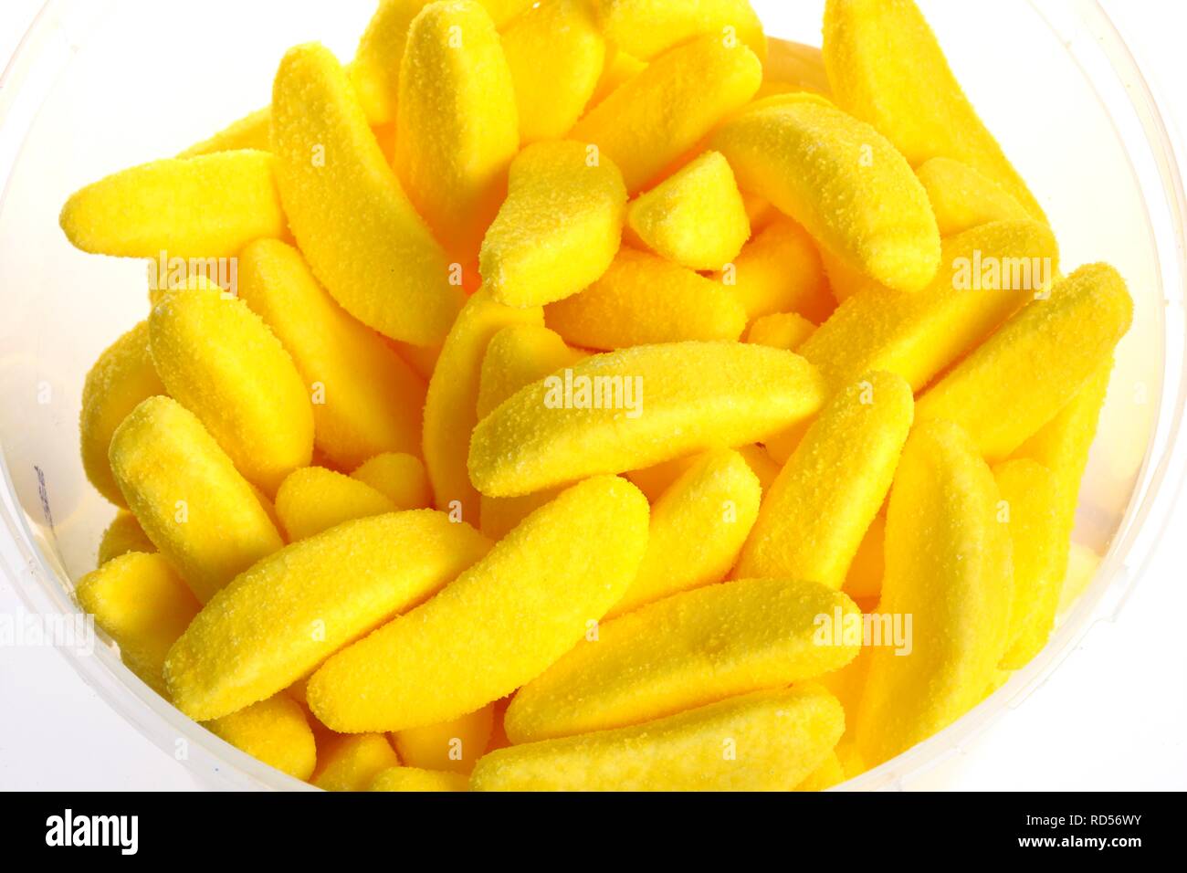 Yellow candy bananas in a clear cup Stock Photo - Alamy