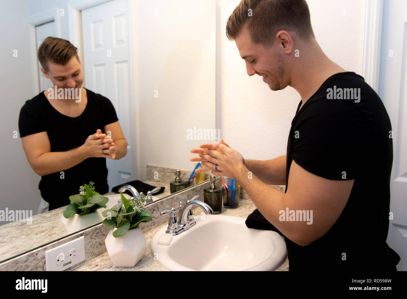 Washing hands soap face hi-res stock photography and images - Alamy