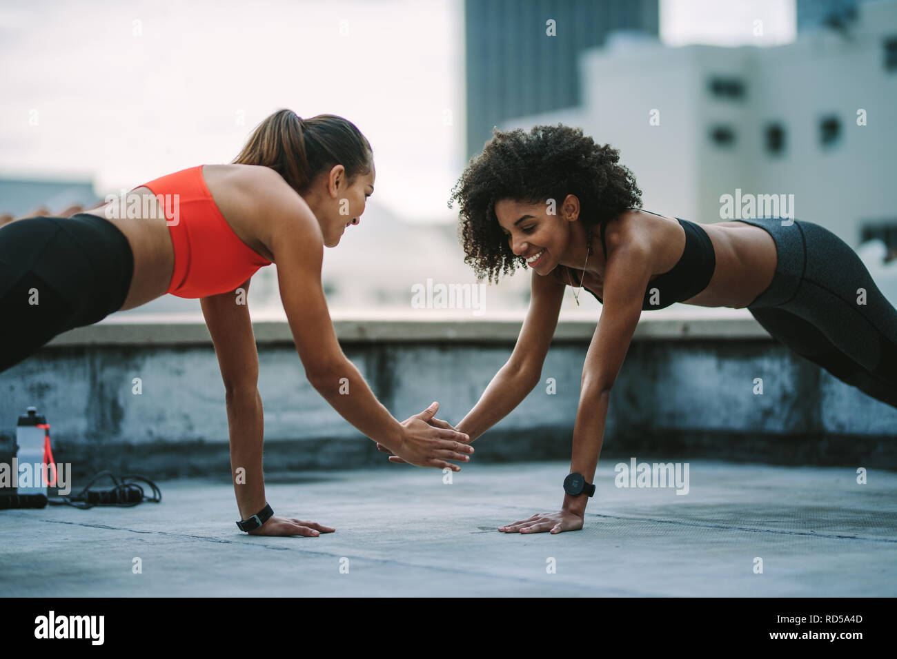 Two women touching each other hi-res stock photography and images - Alamy