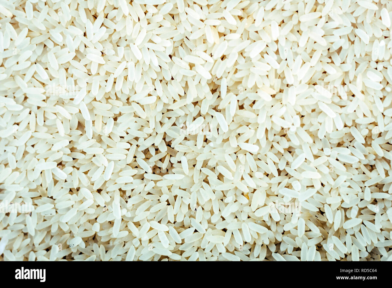 Organic White Long Rice Background Close-up Texture top view Stock ...