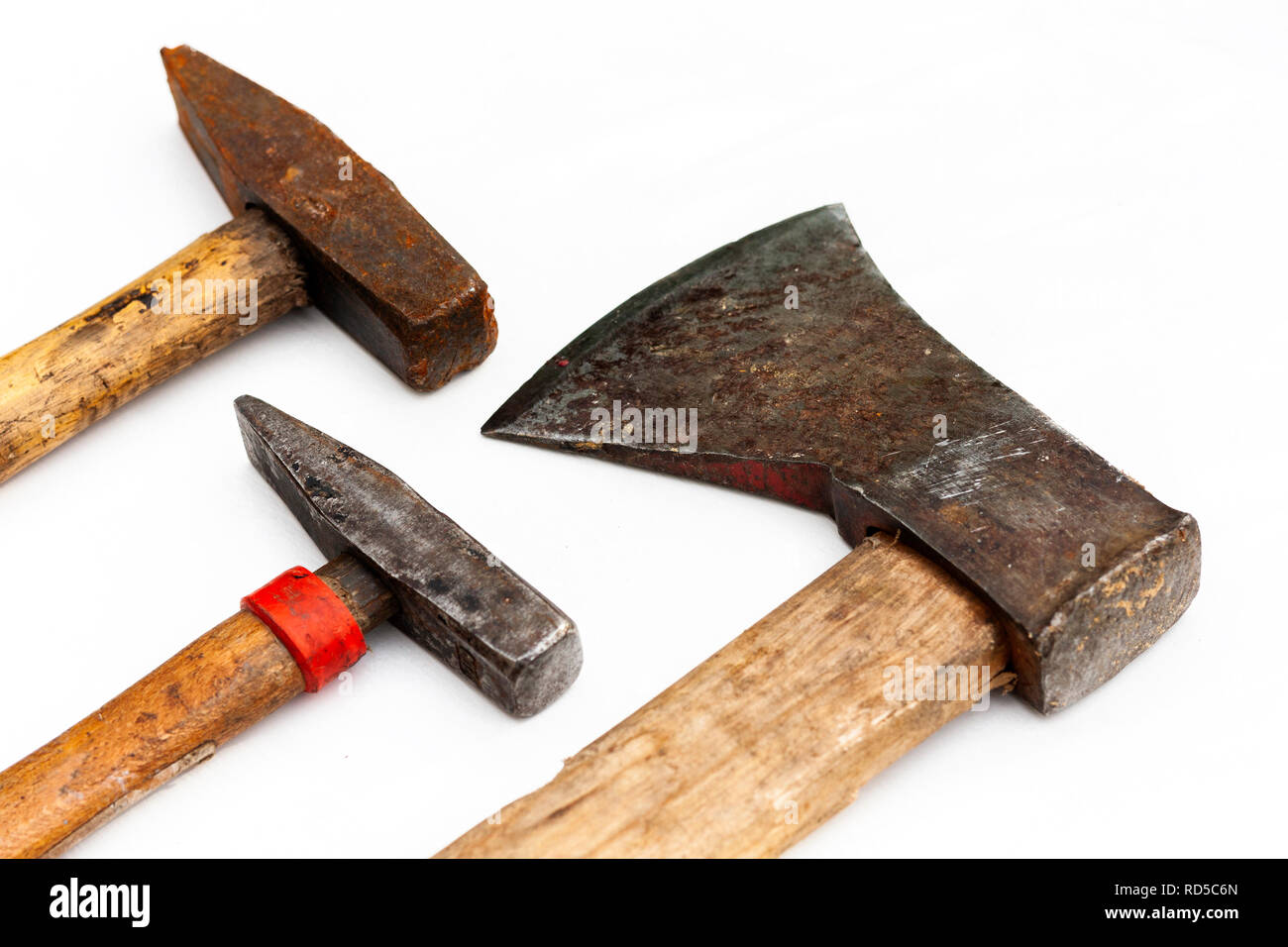 Set of vintage hand construction tools on a white wooden background ...
