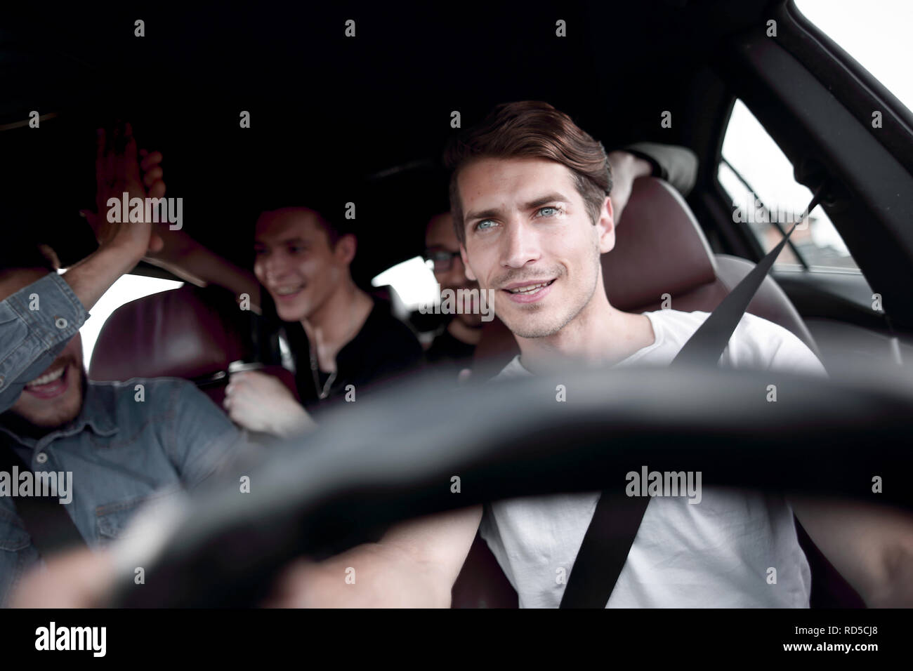 A group of people inside a car, on a road trip Stock Photo - Alamy