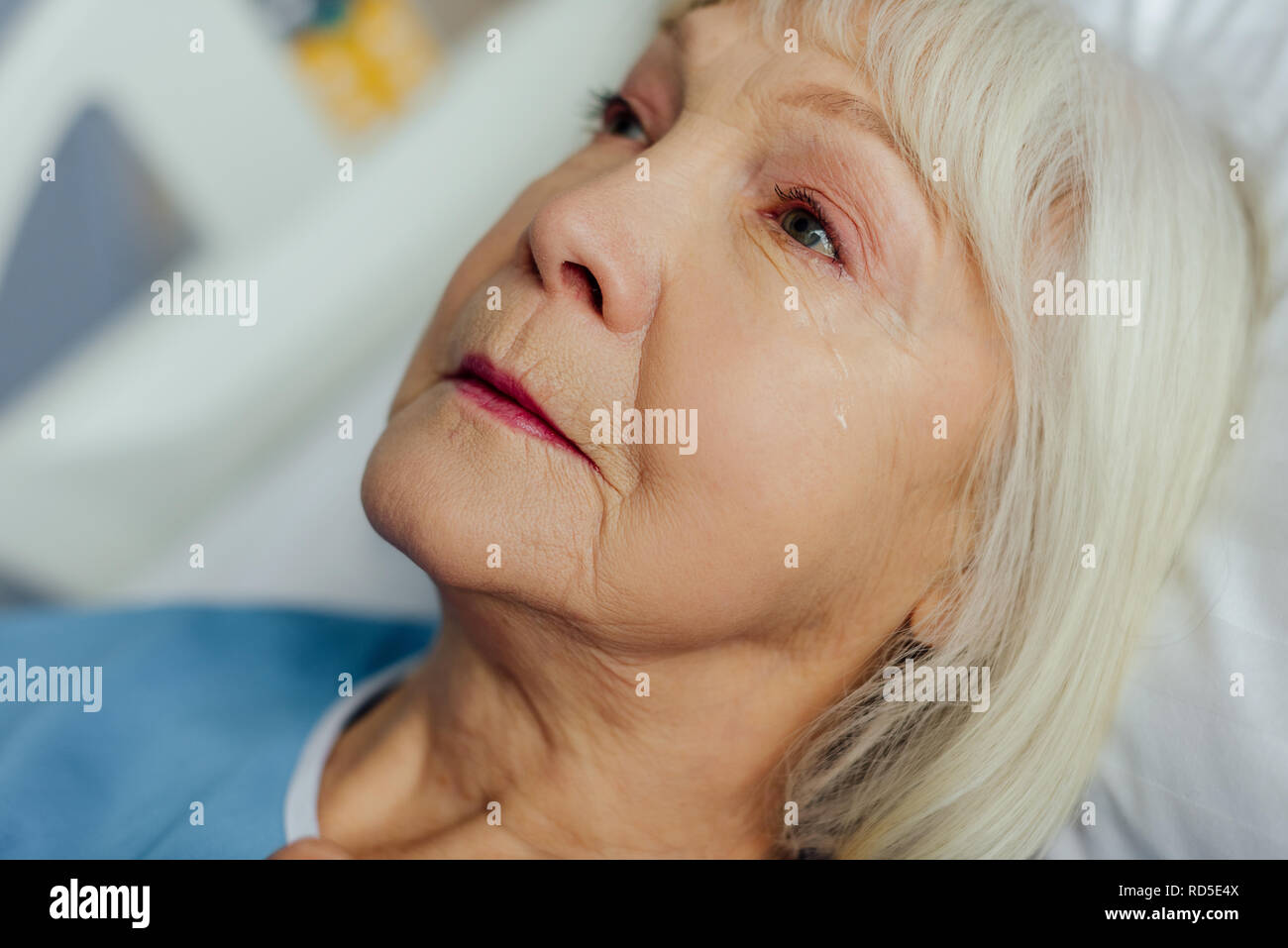 Old woman crying close up hi-res stock photography and images - Alamy