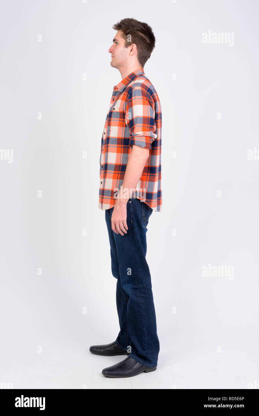 Full body shot profile view of young handsome man Stock Photo - Alamy