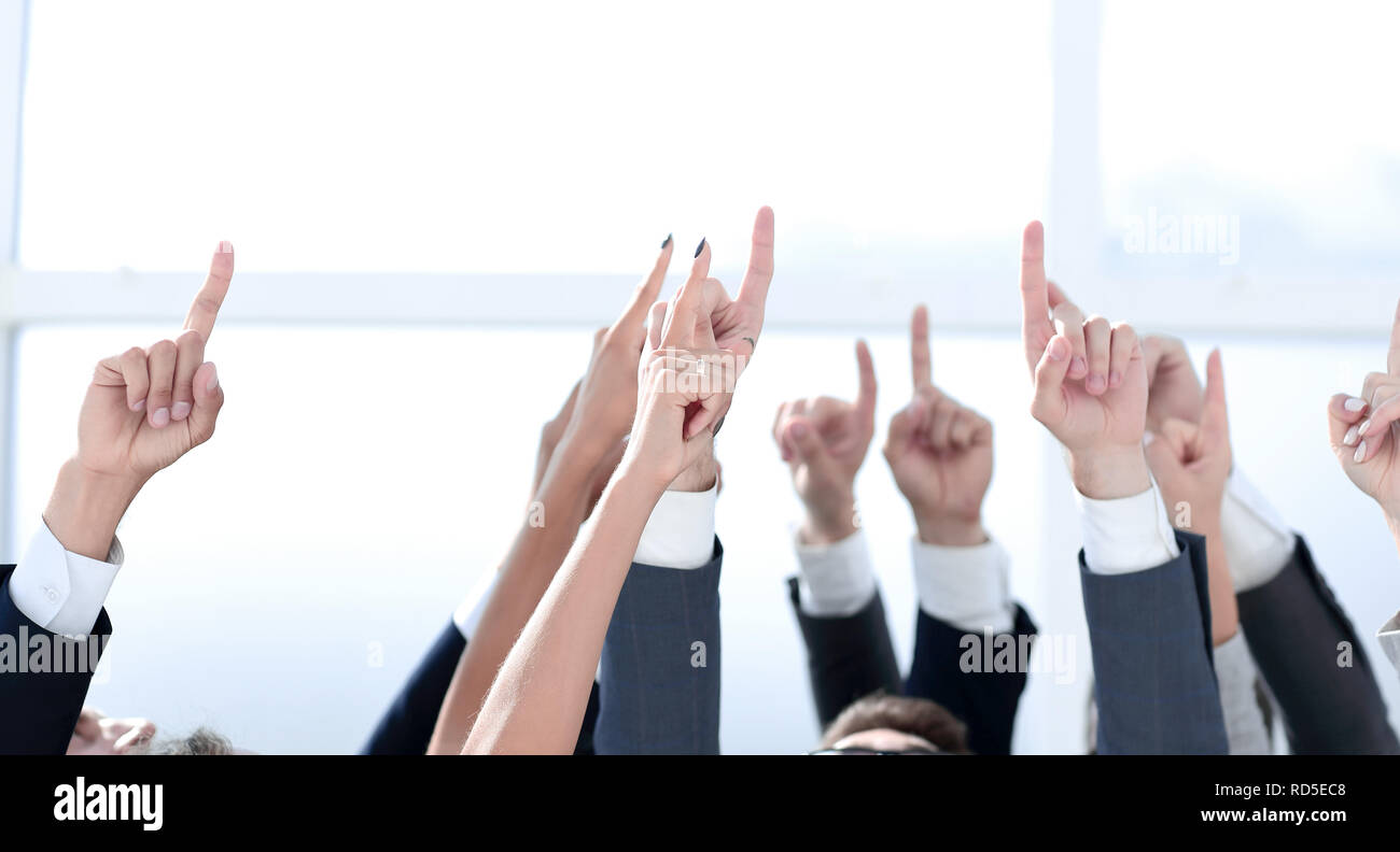 Business team pointing up hi-res stock photography and images - Alamy