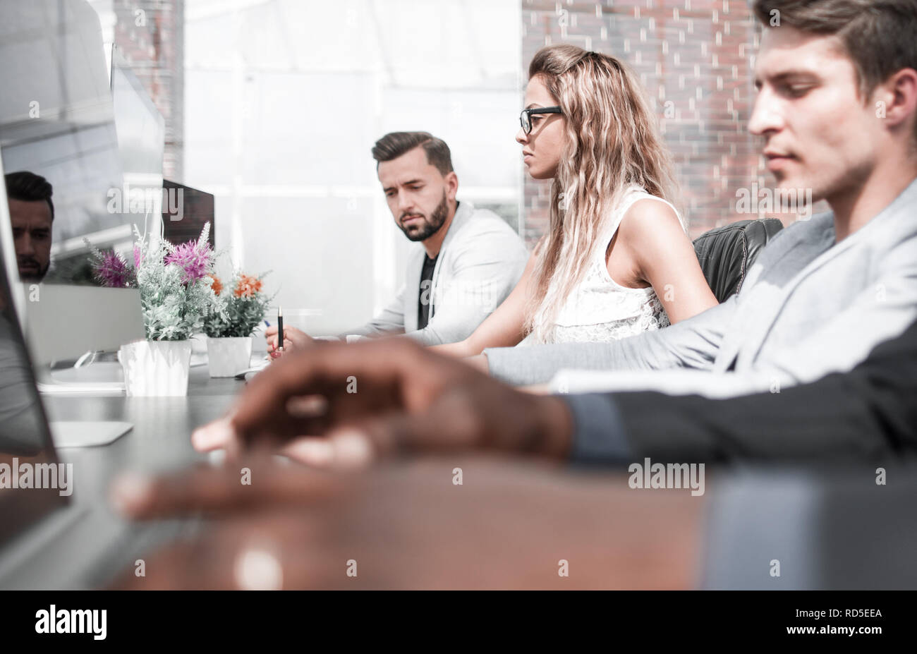Busy multiracial office employees hi-res stock photography and images ...