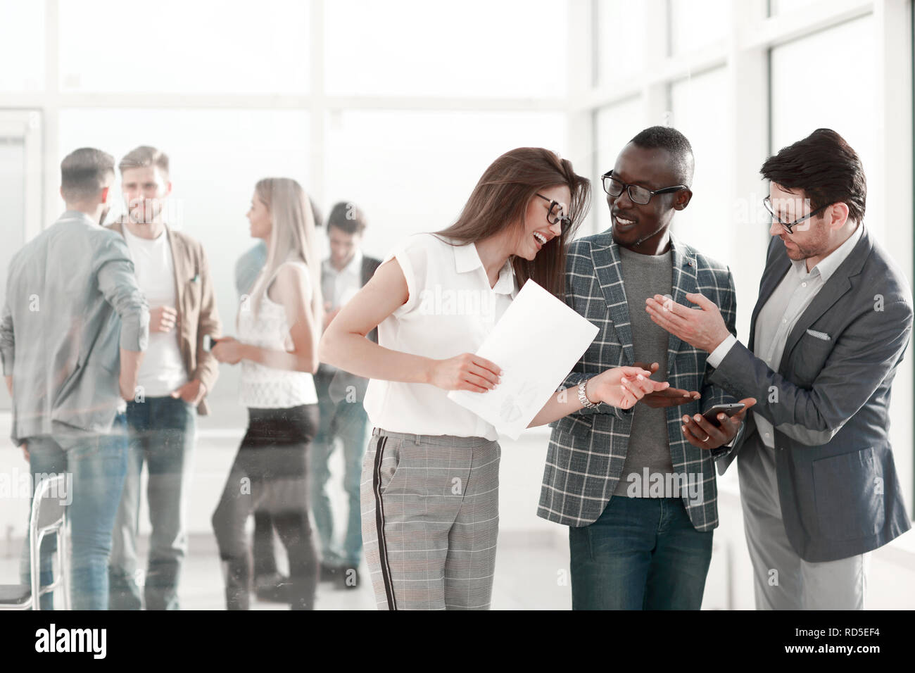 Laughing professional employees talking work hi-res stock photography ...