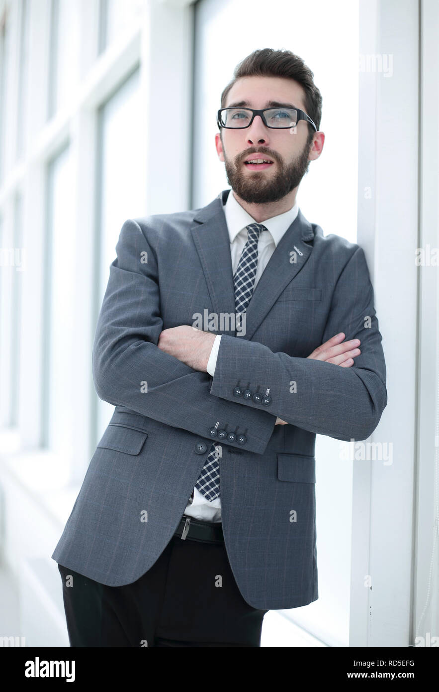 close up.young businessman standing in the office Stock Photo - Alamy