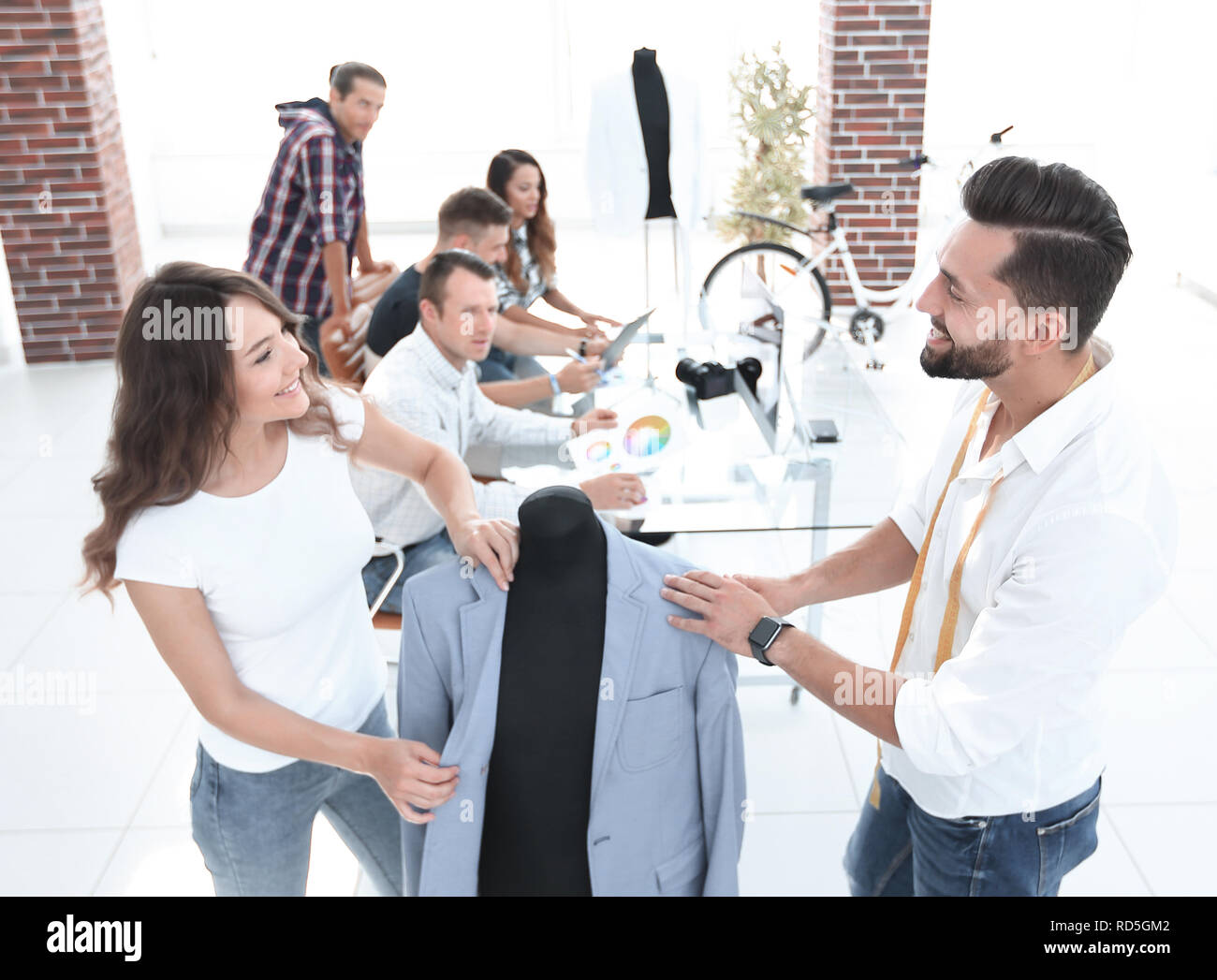 designers working on new models of clothes Stock Photo - Alamy