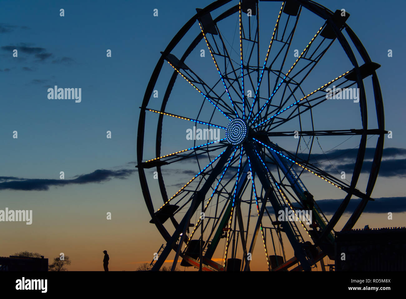 Ferris wheel at sunset Stock Photo - Alamy