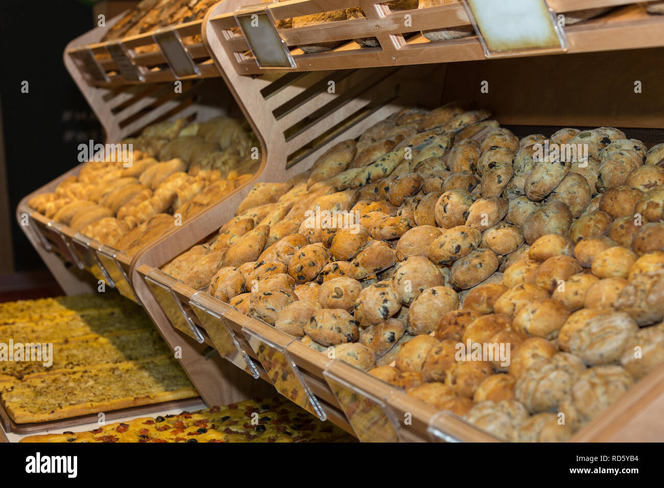 Group of Various Types of Bread, and Loaves inside a Bakery Stock Photo ...