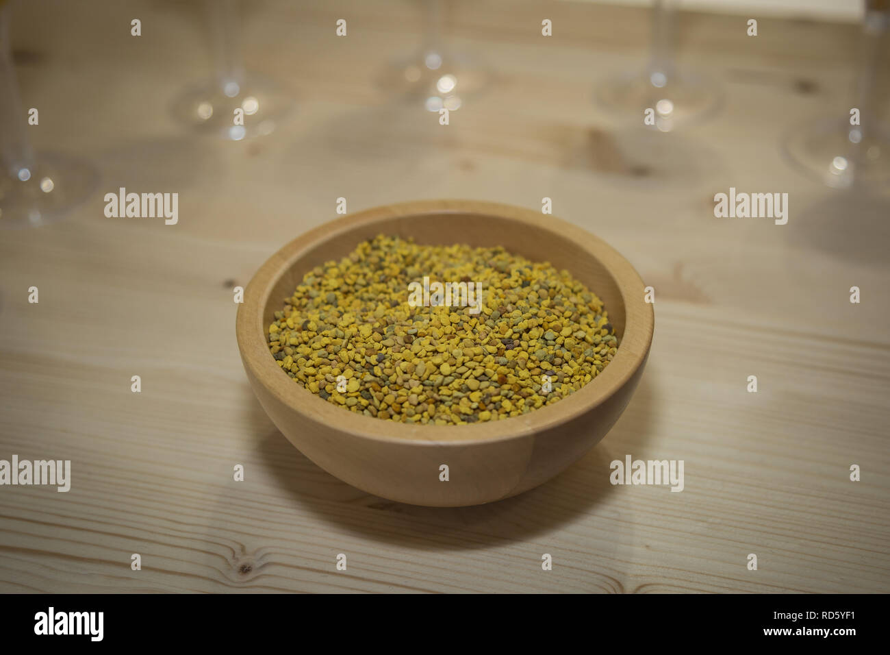 Pollen from Bees: Small Green and Yellow Grains in a Round Wooden Bowl ...