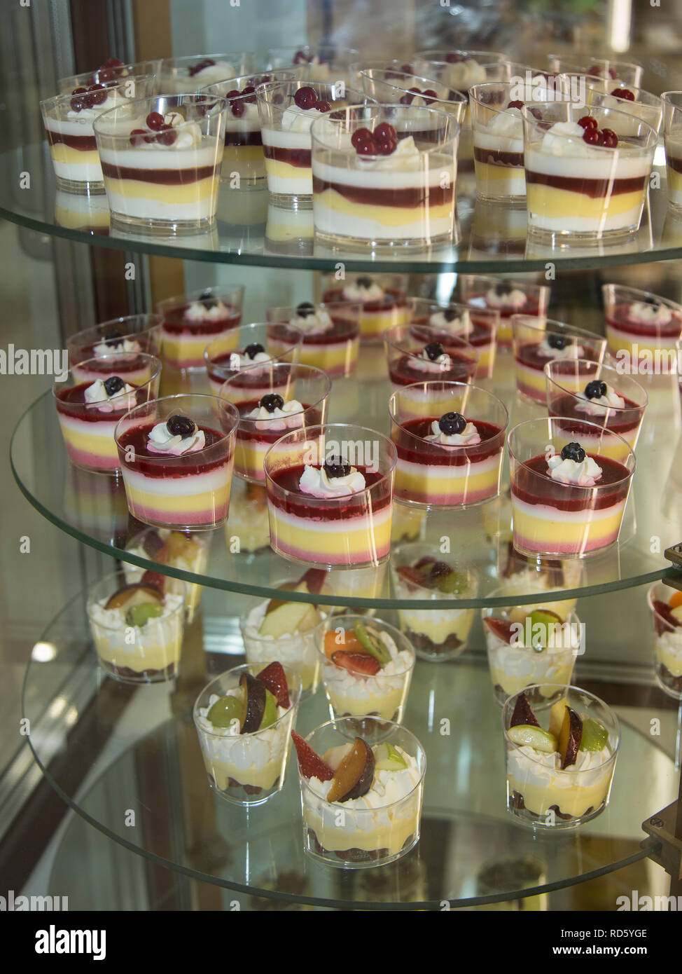 Single Portions of Mousse Packaged inside a Pastry Display Stand Stock ...