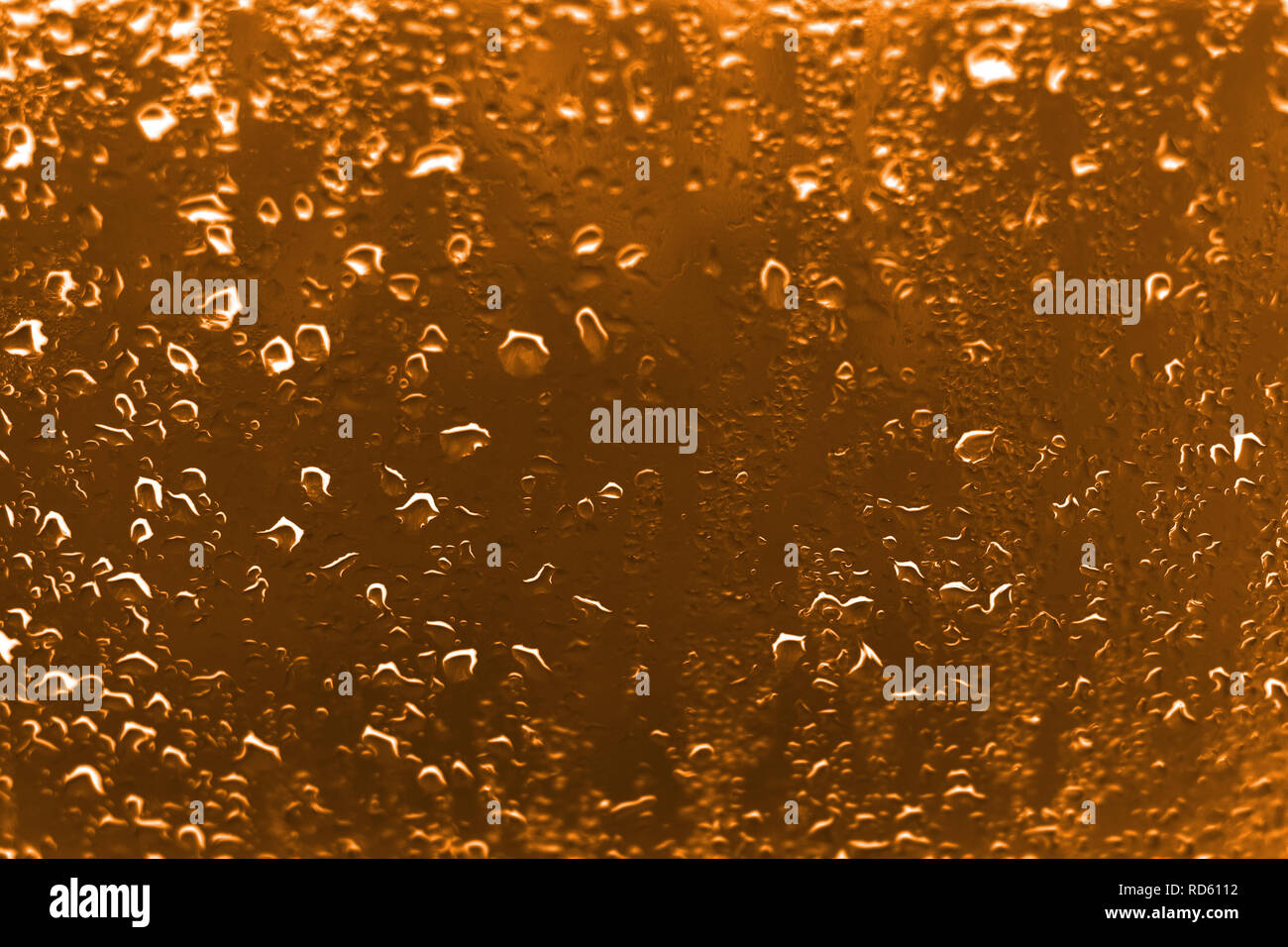 High contrast photo of drops of rain on a window glass with vivid ...