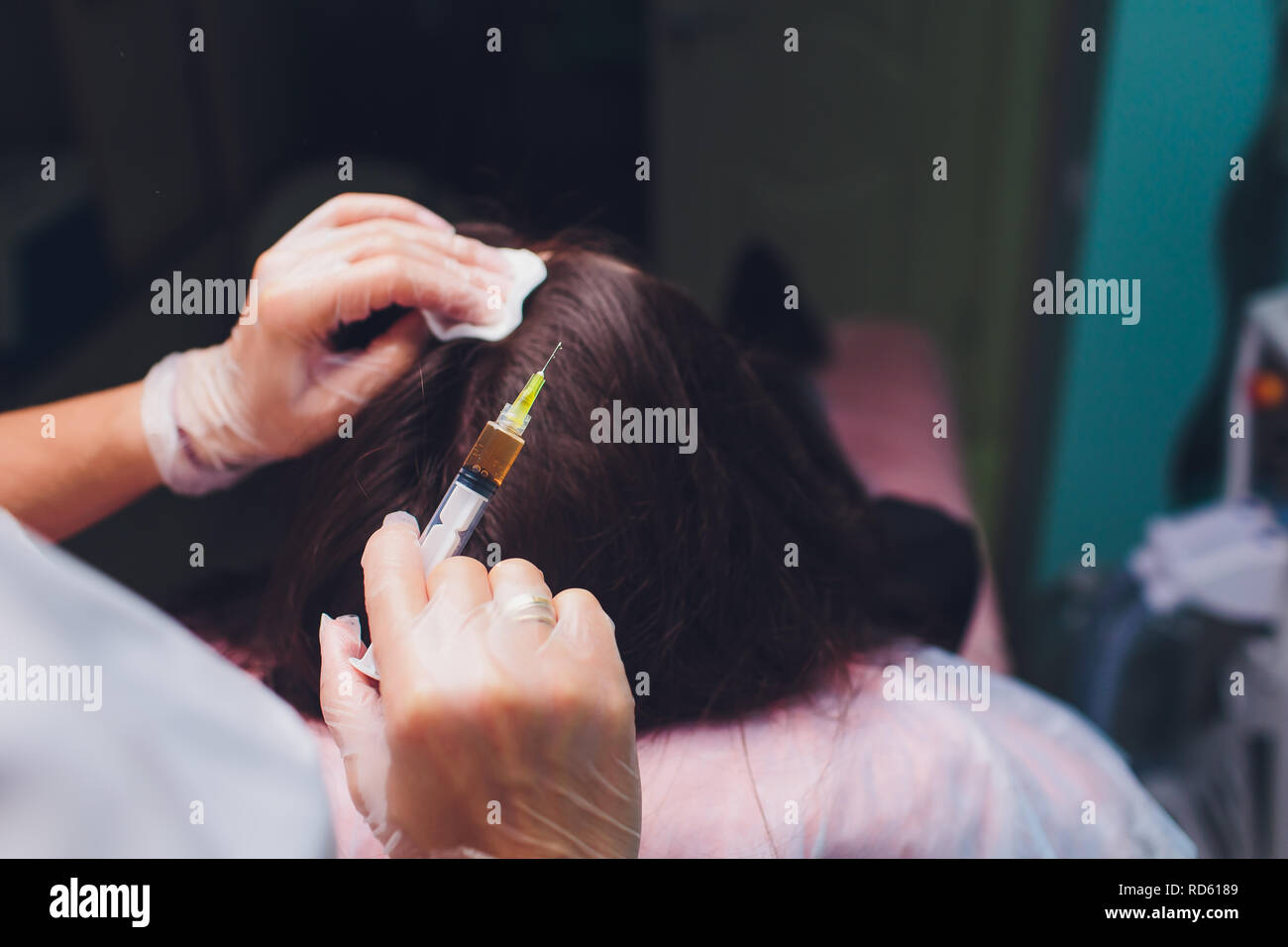 Beautiful woman getting injection for hair growth Stock Photo - Alamy