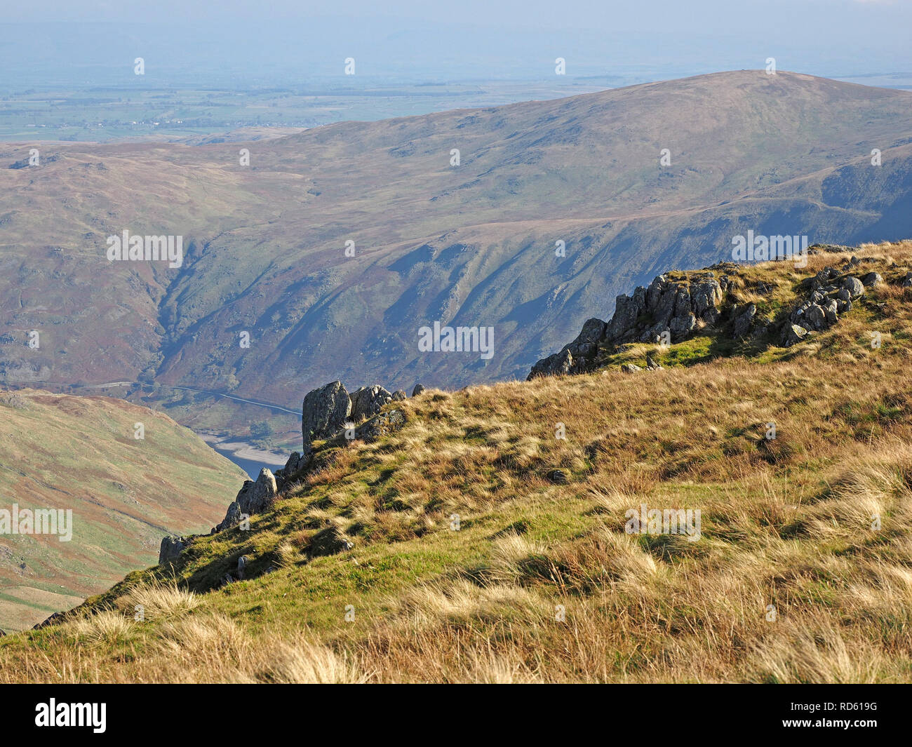 spectacular landscape with upland rock formations in the Lakeland Fells ...
