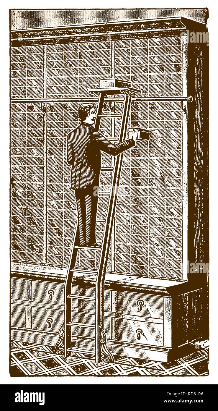 Inside a historic store a salesman standing on a floor track bike ...