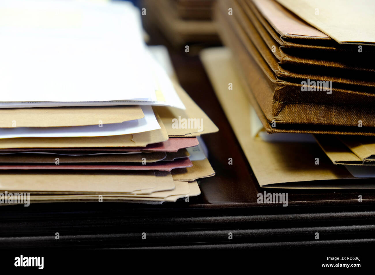 Files and Folders on Desk Work Busy Information working Stock Photo - Alamy