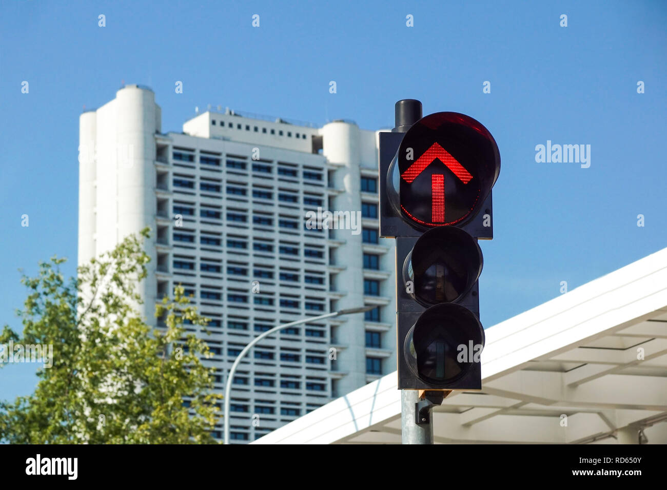 Red traffic light in the city streets, with red arrow traffic light ...