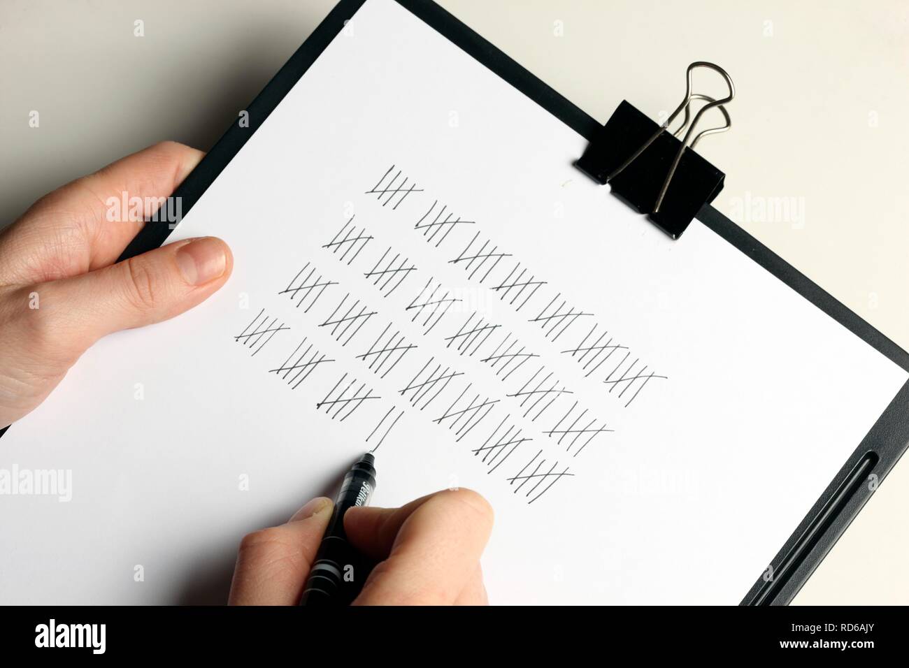 Tally by hand Stock Photo - Alamy