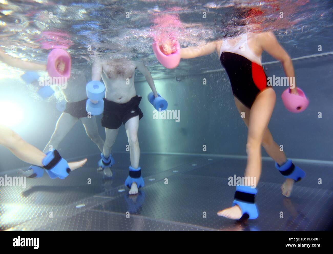 Patients doing aqua aerobics, water aerobics, exercise therapy ...