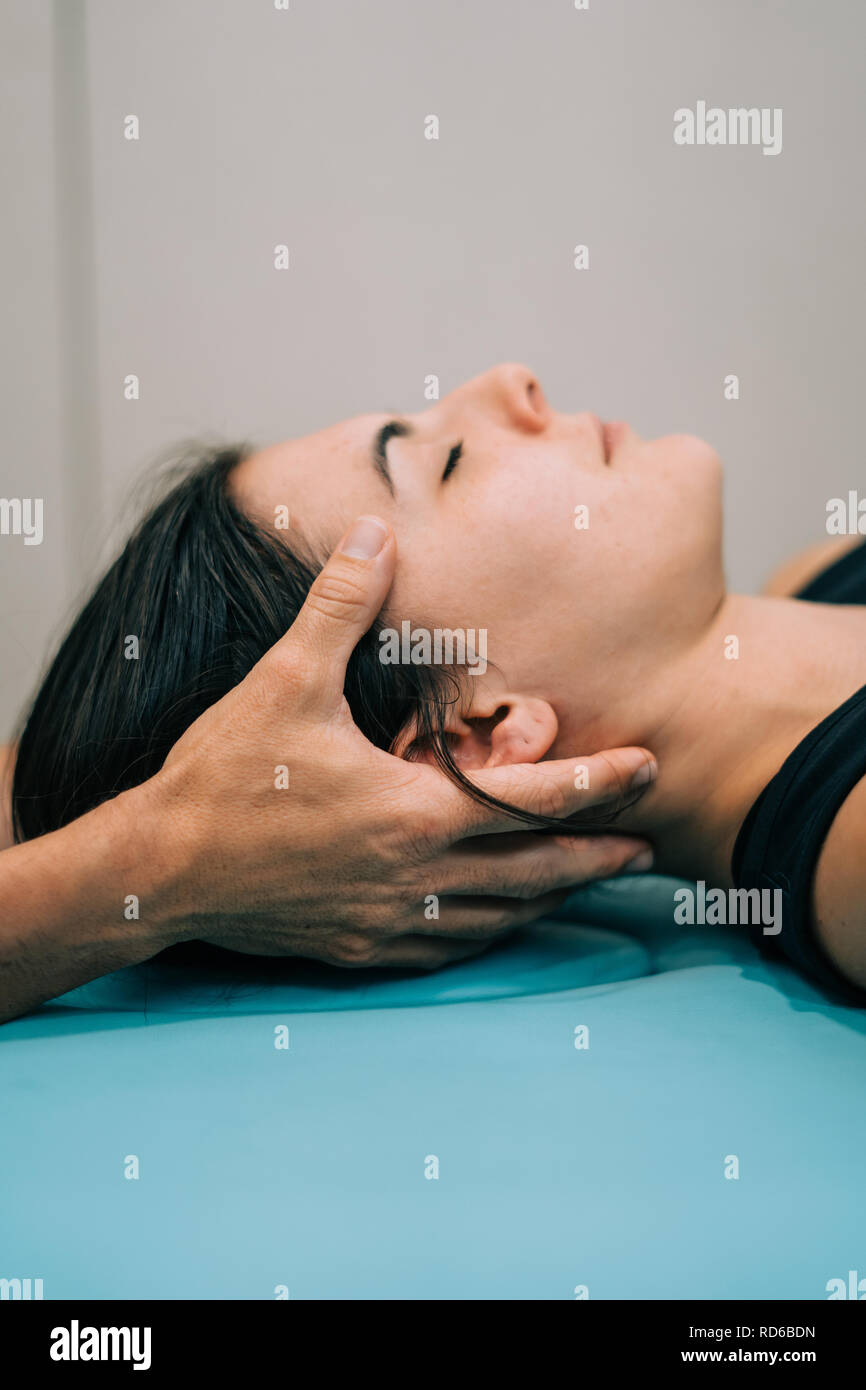Physiotherapist doing neck massage patient hi-res stock photography and ...