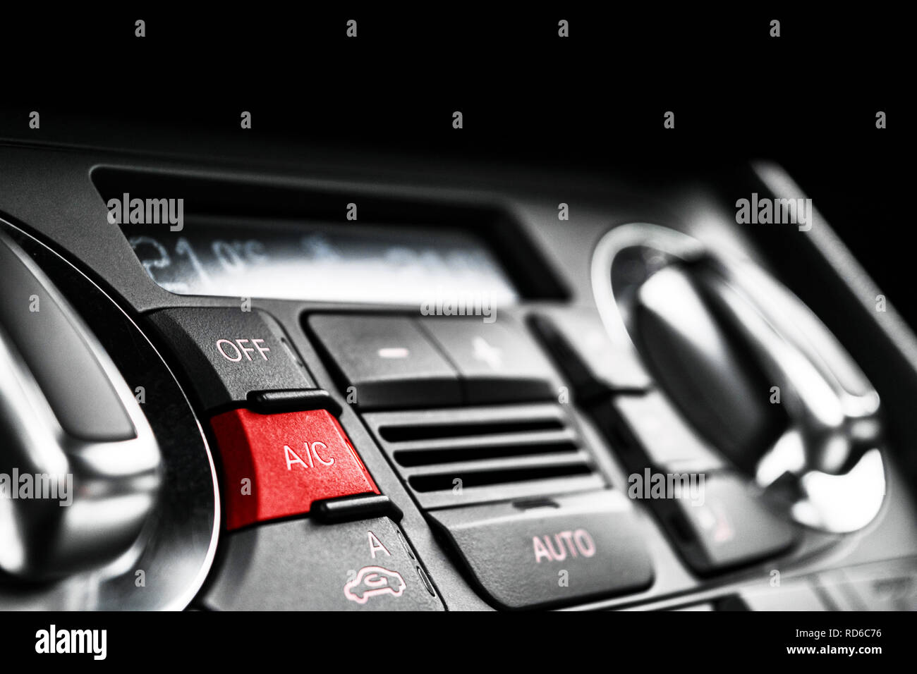 Air conditioning button inside a car. Climate control AC unit in the ...