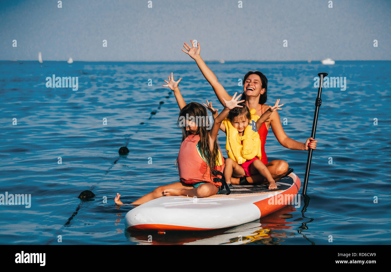 Girl paddle board parent hi-res stock photography and images - Alamy