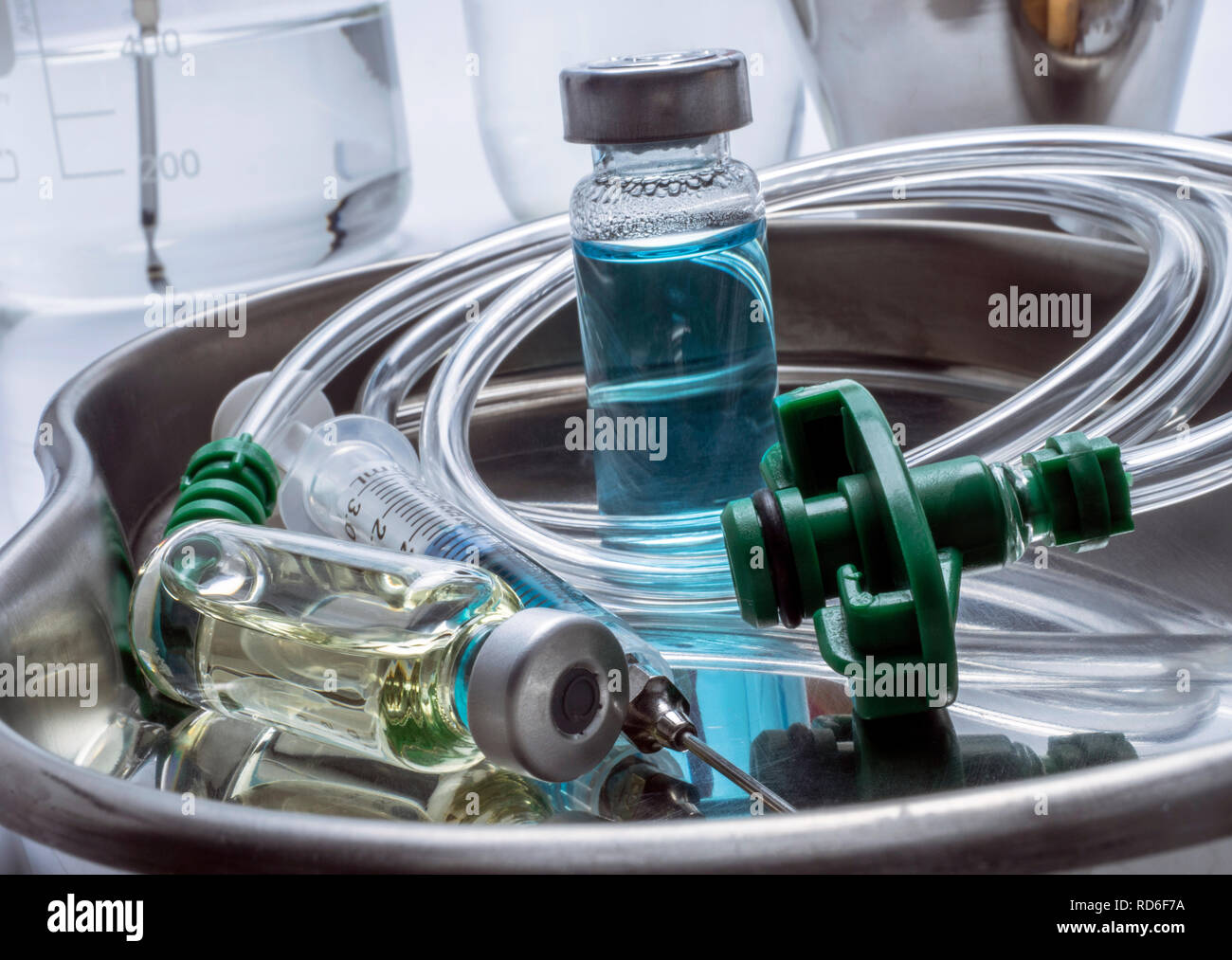 Multiple vial and syringe in a tray metal, conceptual image Stock Photo ...
