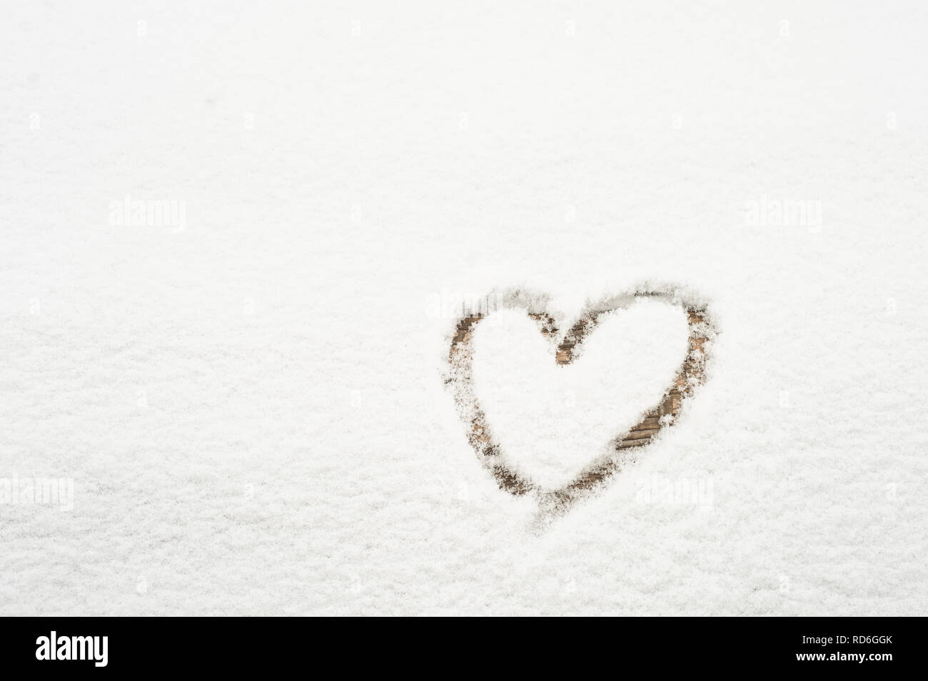heart in snow background white texture Stock Photo - Alamy