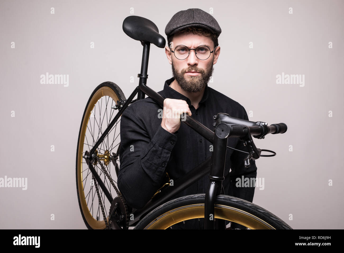 Man standing pose with cycle hi-res stock photography and images - Alamy
