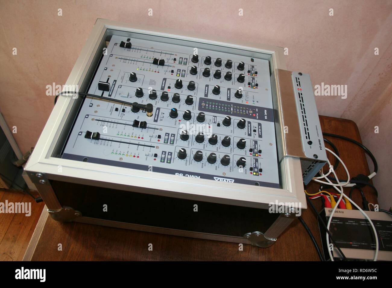 AMIX RMC55 DJ mixer (right-side angled), with AMP 24 power supply, and ...