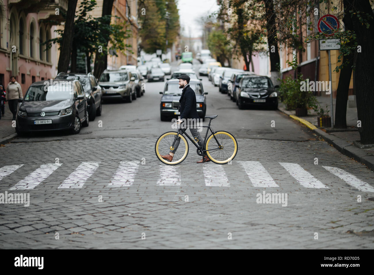 Young man walking across hi-res stock photography and images - Alamy