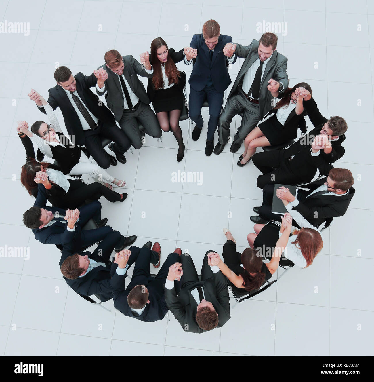 concept of team building.large business team sitting in a circle Stock ...