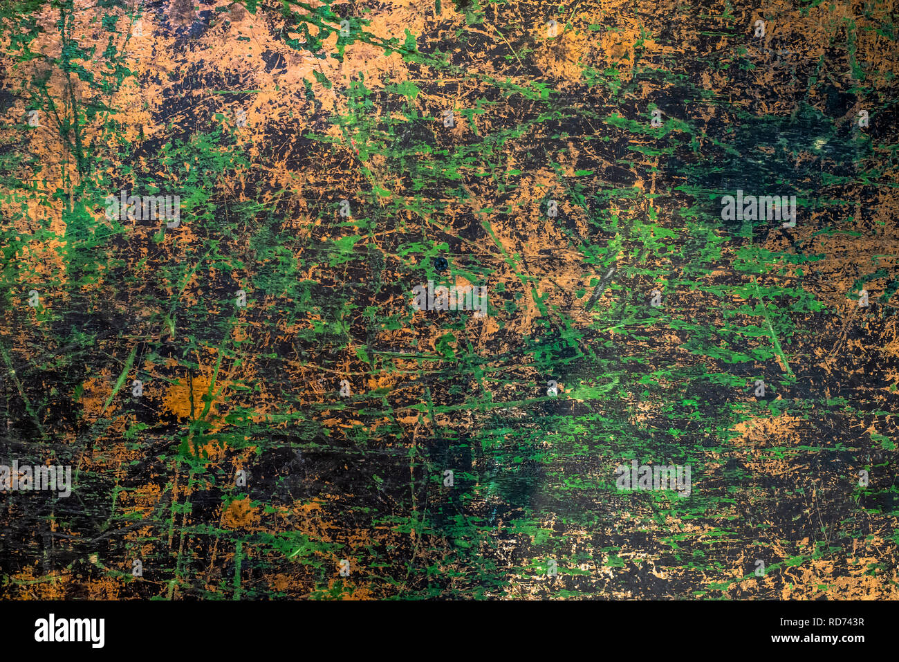 Background of green and black scratched paint. Vintage look backdrop ...