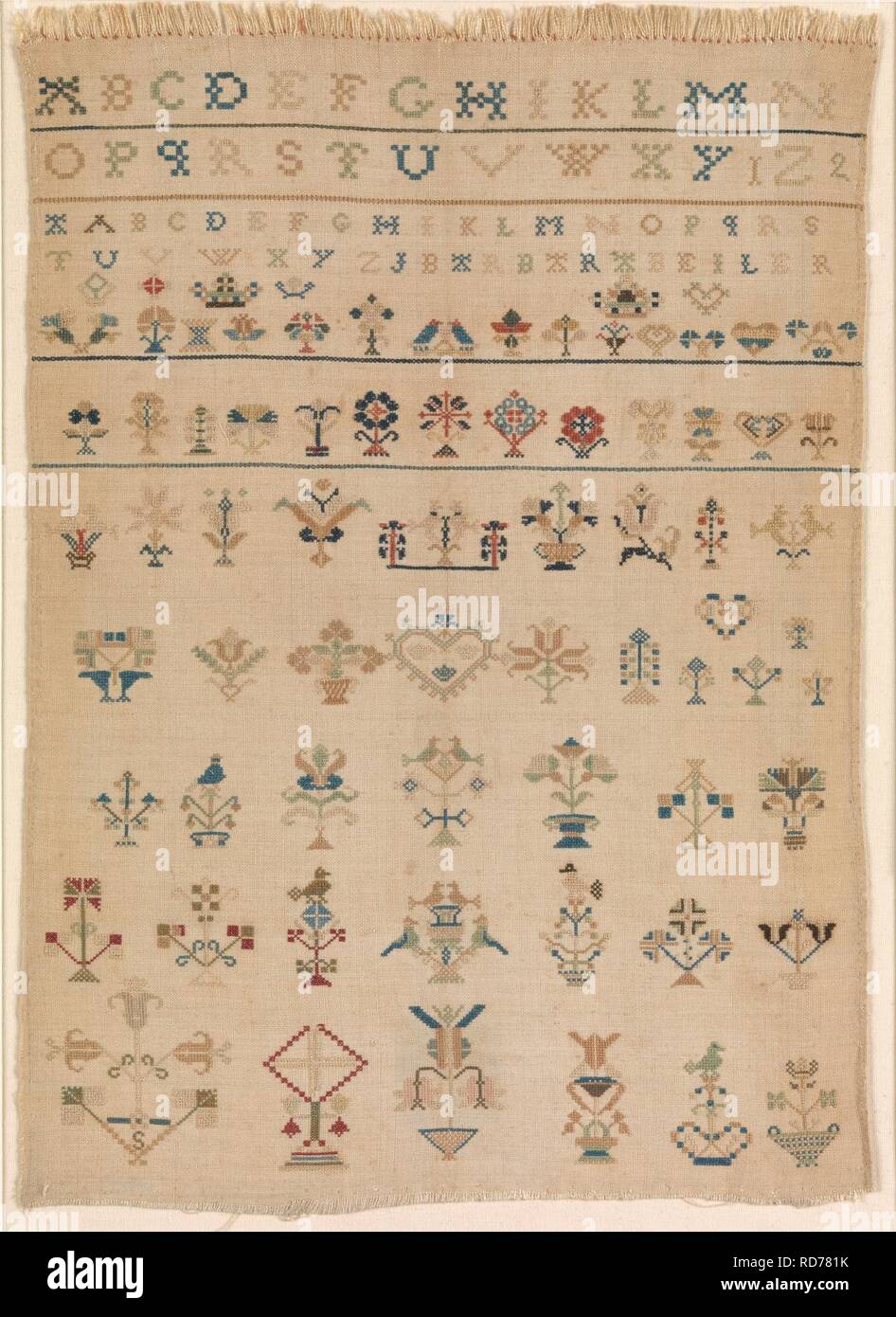 Amish sampler with lettering and motifs Stock Photo - Alamy