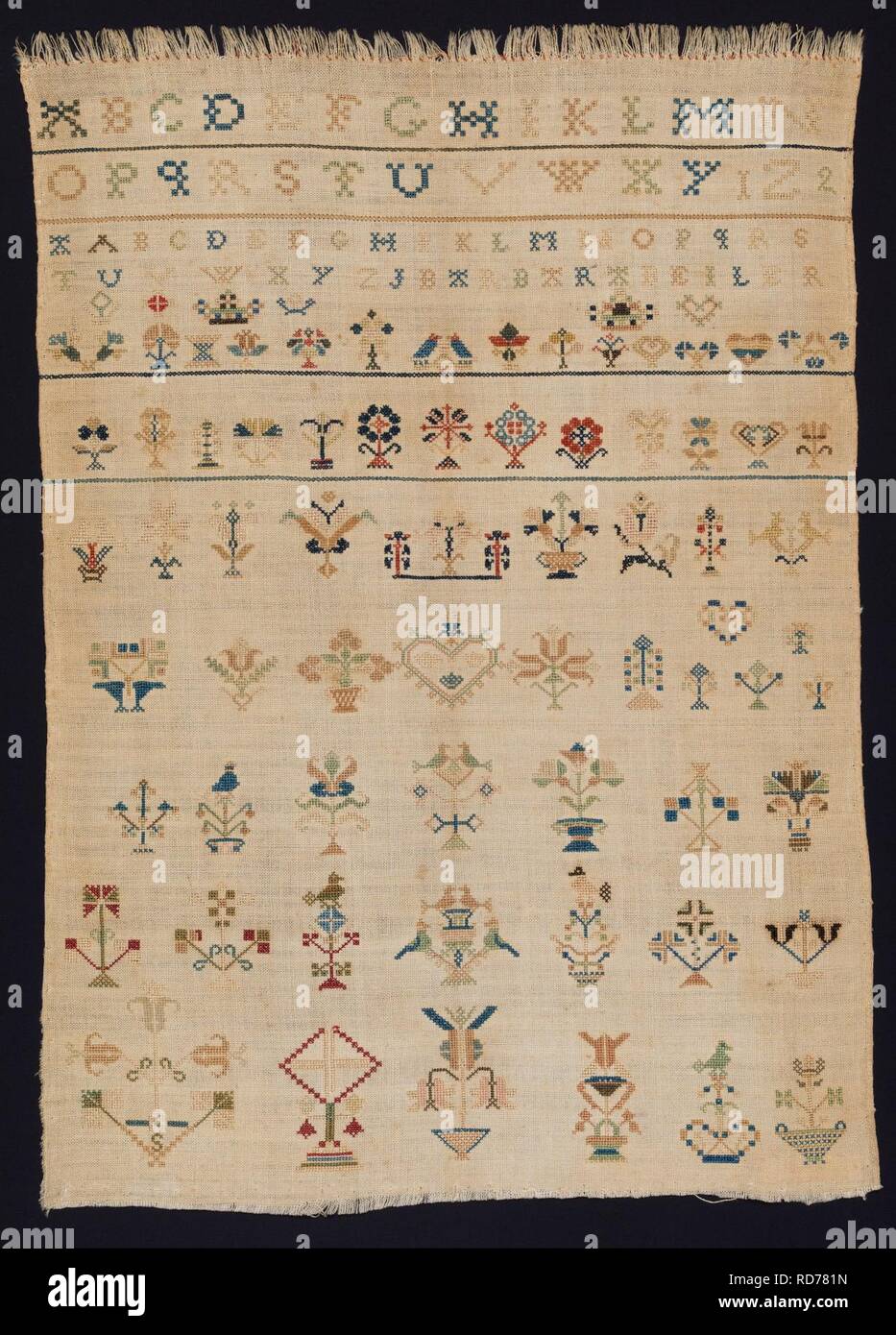 Amish sampler with lettering and motifs Stock Photo - Alamy