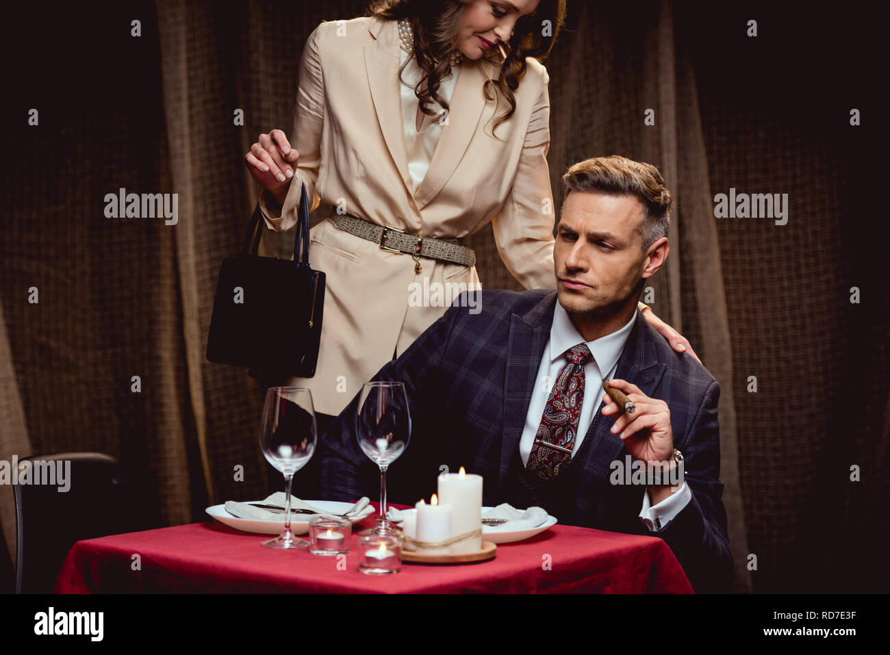 Couple dinner restaurant serious hi-res stock photography and images ...