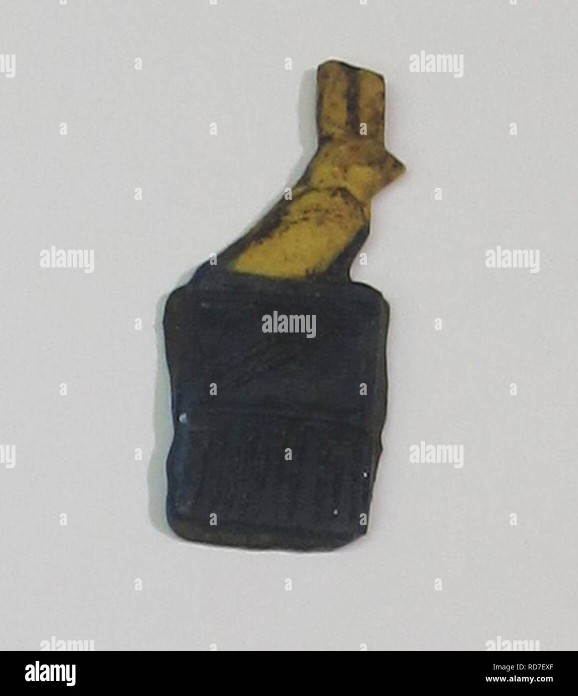 Amulet of serekh sign surmounted by archaic falcon Stock Photo - Alamy