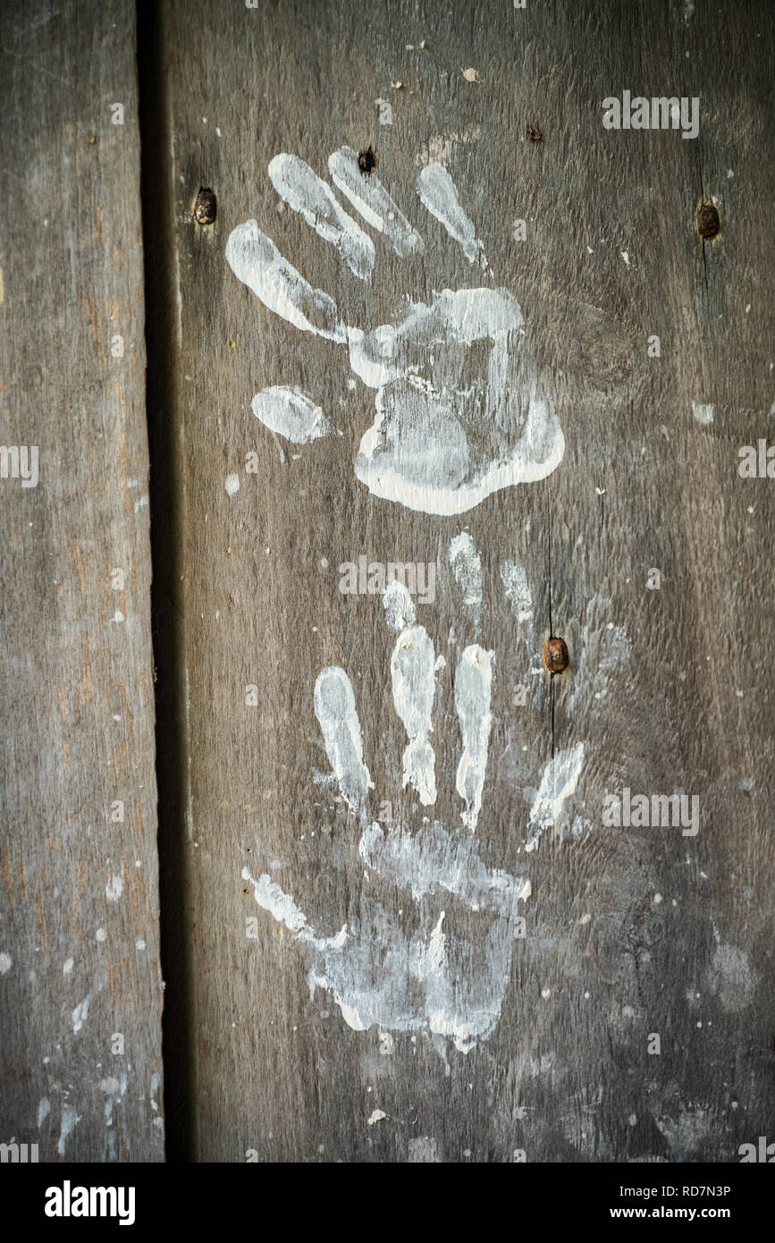Mud hand prints hi-res stock photography and images - Alamy