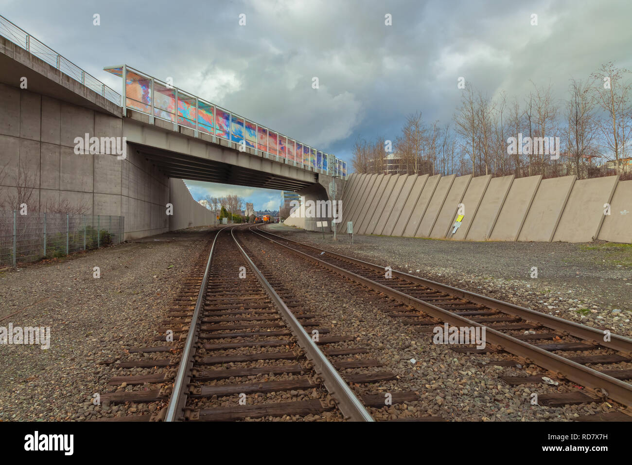 Railroads run underneath the overpass at Olympic Sculpture Park ...