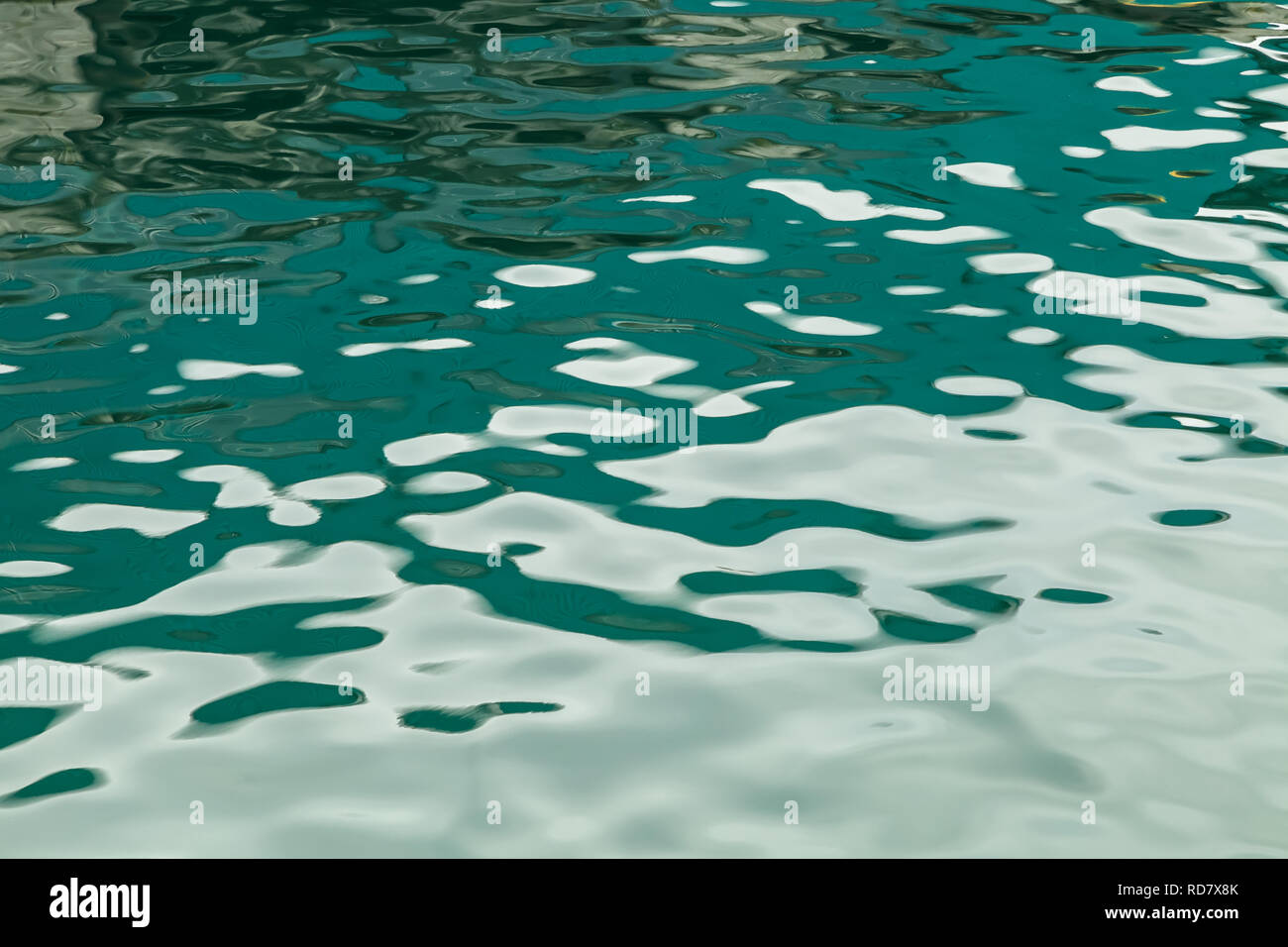 Daylight reflect on water surface at Pier 57, Seattle, Washington, USA ...