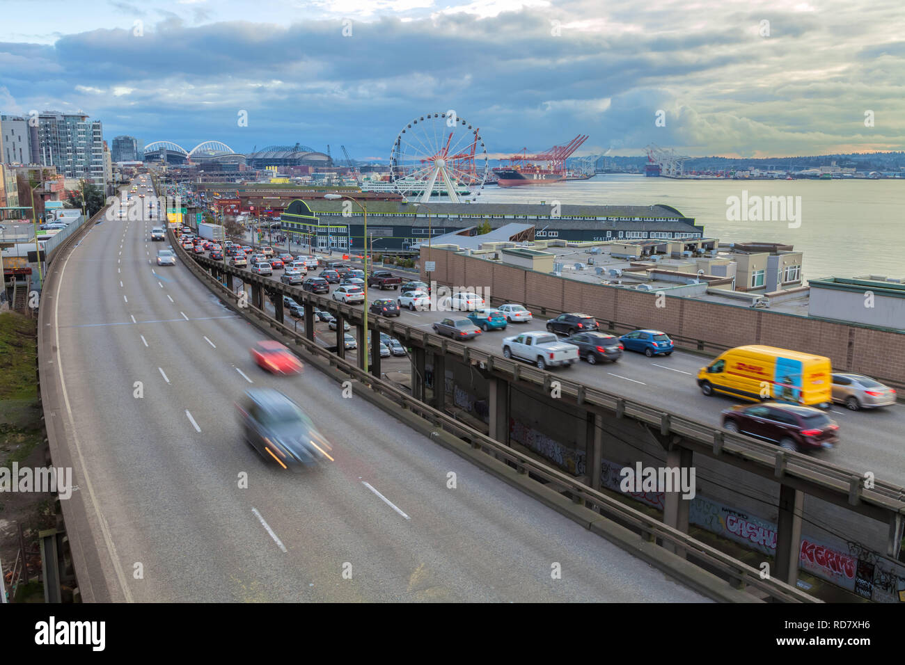 State Route 99 run through Downtown Seattle during rush hour in evening ...