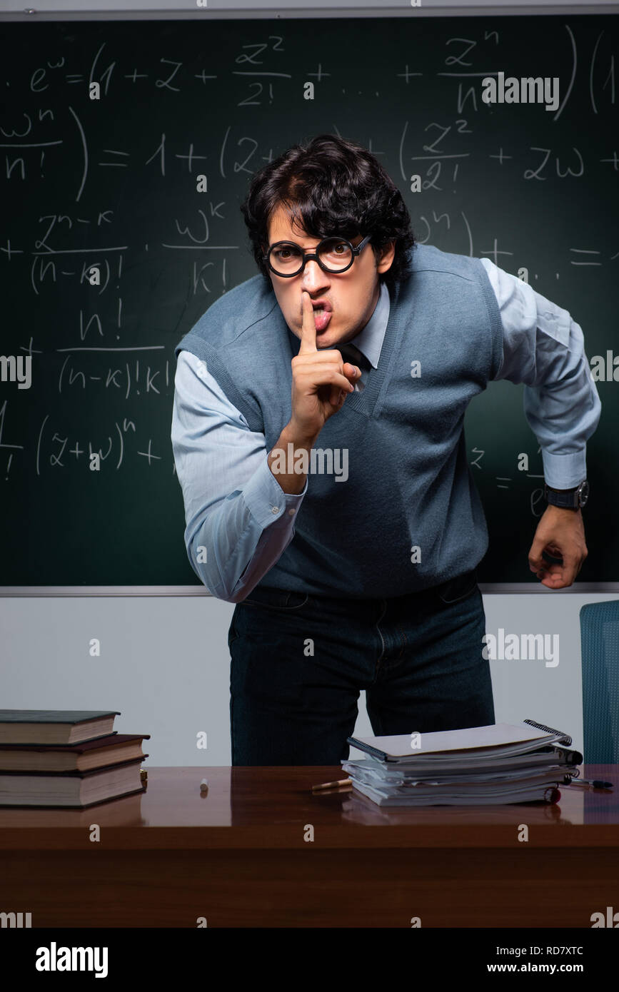 Man in front of blackboard math hi-res stock photography and images - Alamy